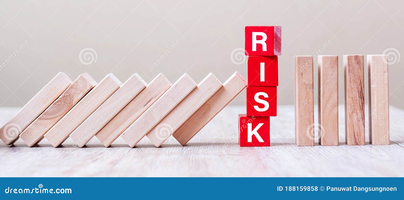 Red RISK Cube Blocks Stop Falling Blocks on Table. Fall Business ...