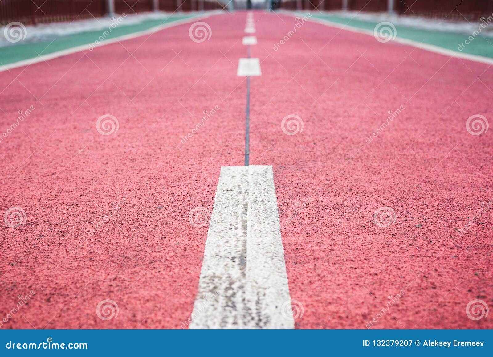 Red road with markings stock image. Image of material - 132379207