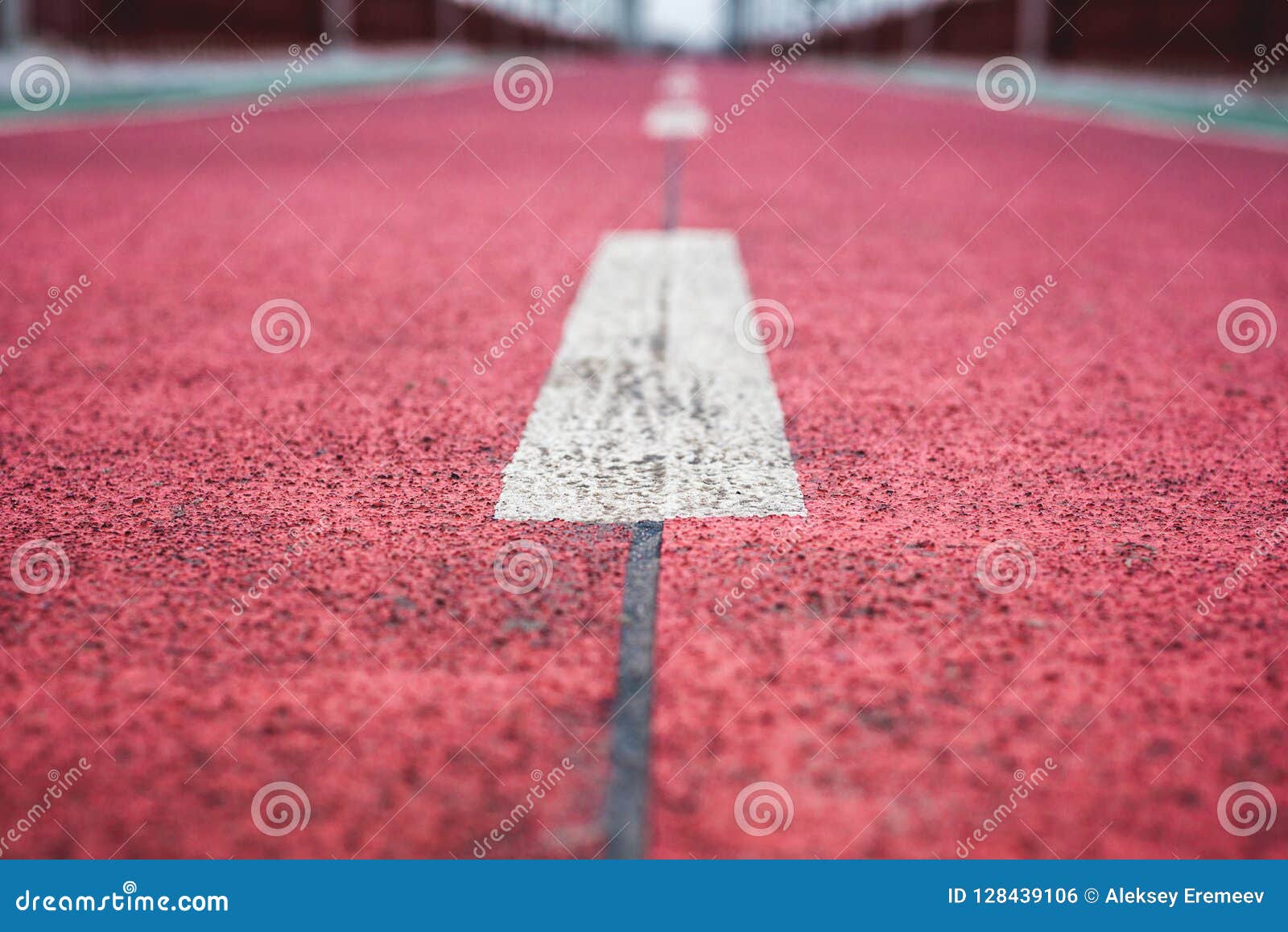 Red road with markings stock photo. Image of pair, dotted - 128439106