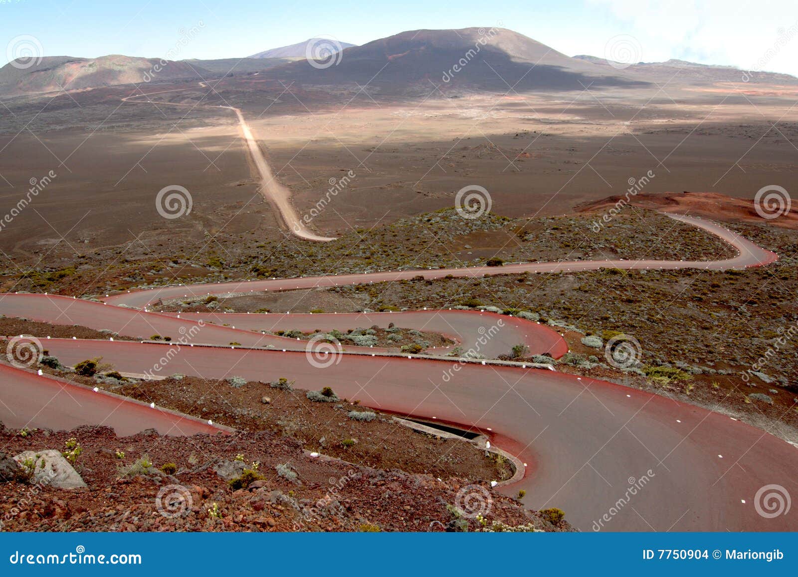 Red road winding its way stock photo. Image of flow, crossing - 7750904