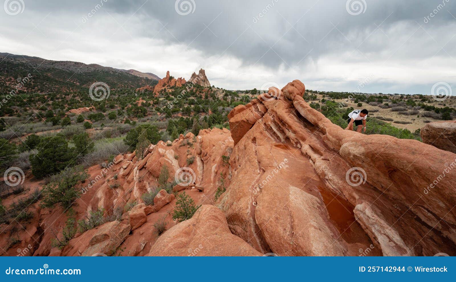 Red Rock Cliff with a Cloudy Blue Sky Stock Photo - Image of natural ...