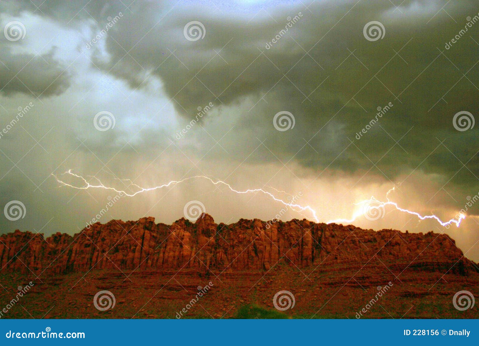 Red Rock Cliff Lighting stock photo. Image of storm, strike - 228156