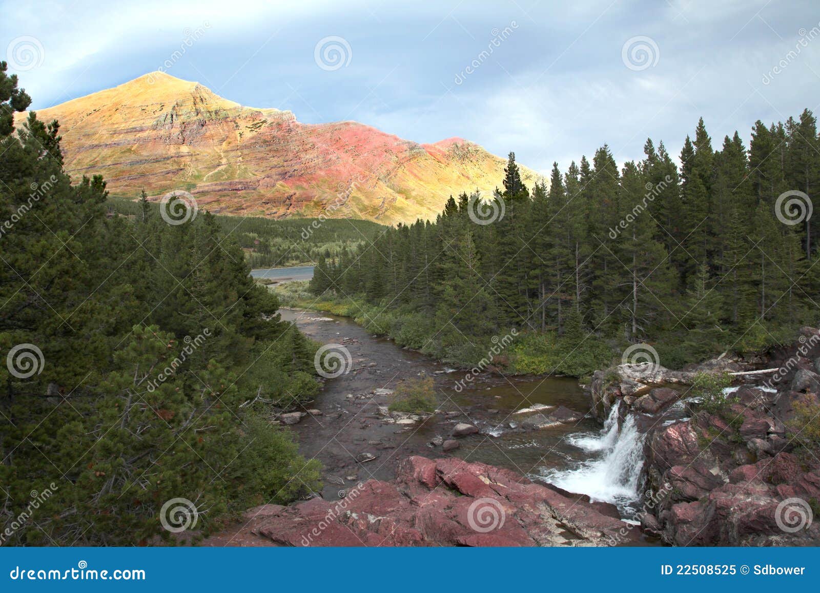 Red Rock Falls and Mountain at Sunset, Glacier N P Stock Image - Image ...