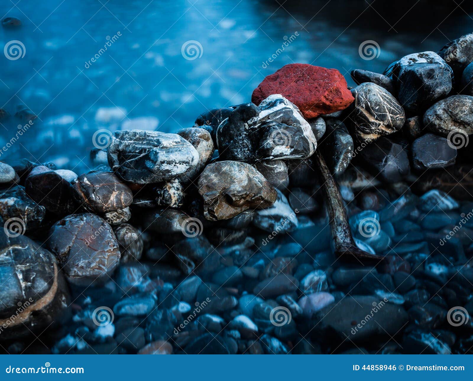 Red rock near the sea stock photo. Image of closeup, utensils - 44858946