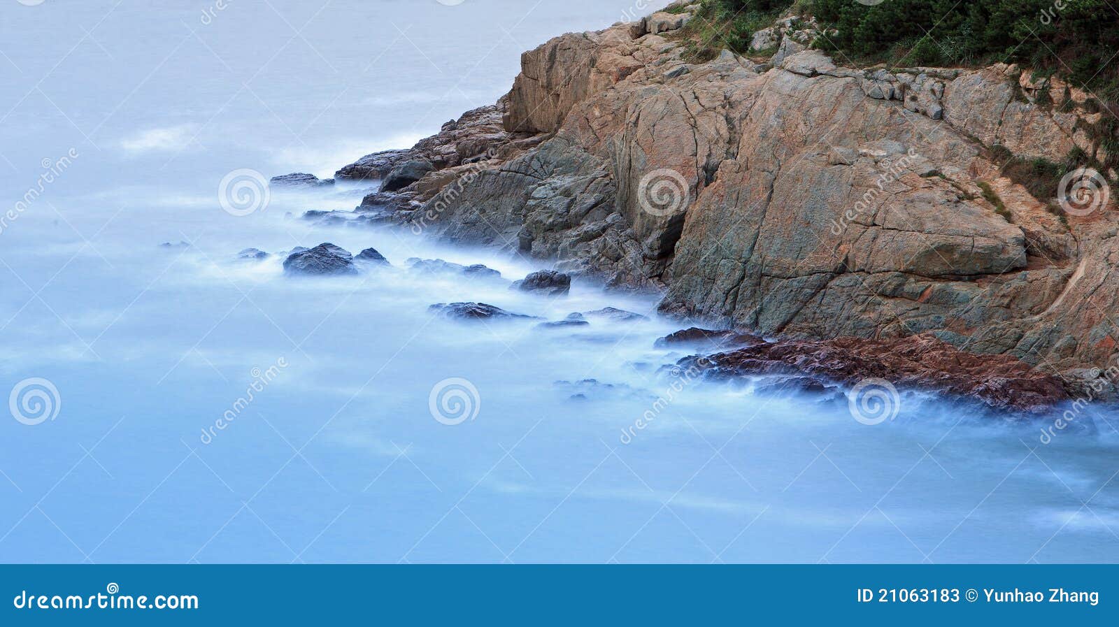 Red rock in the sea stock image. Image of slow, water - 21063183