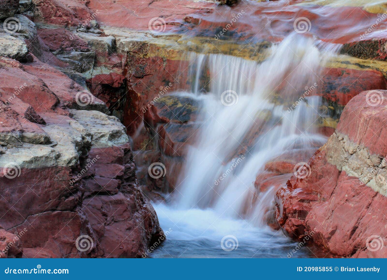 Red Rock and Waterfall - Waterton Lakes, Al Stock Image - Image of ...