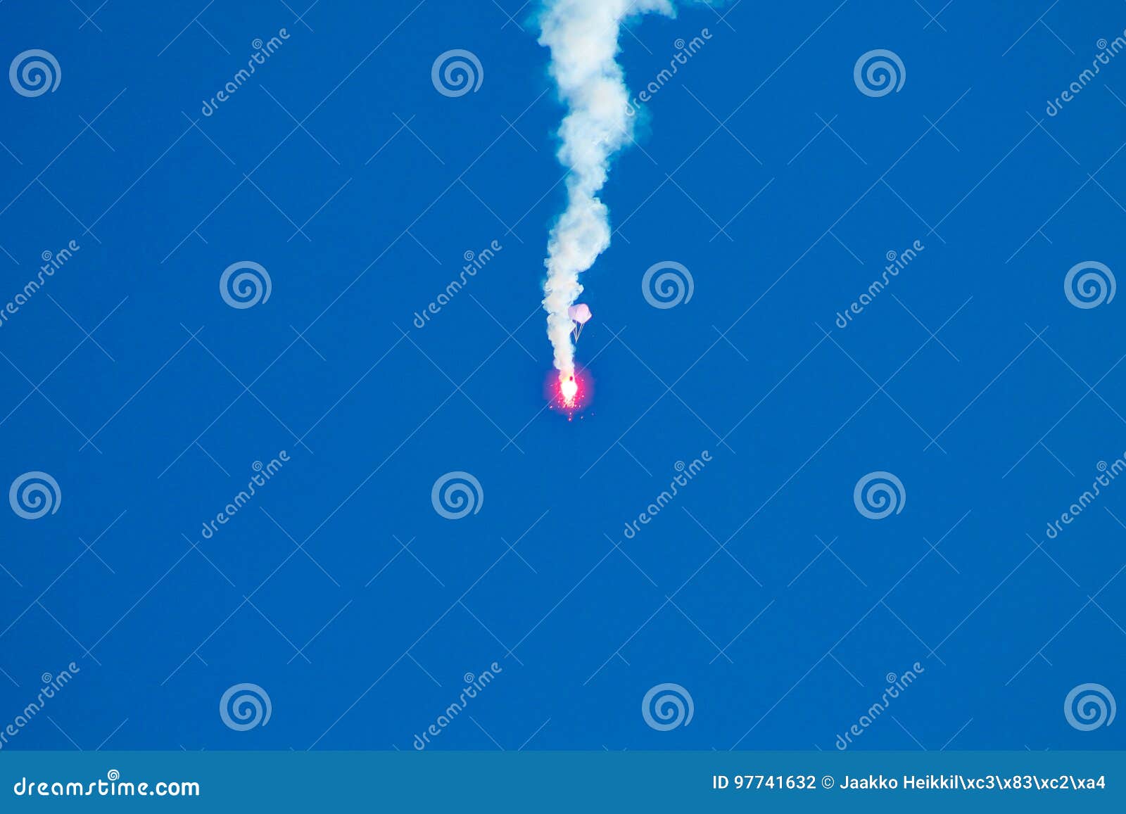 A red rocket and blue sky stock photo. Image of falling - 97741632