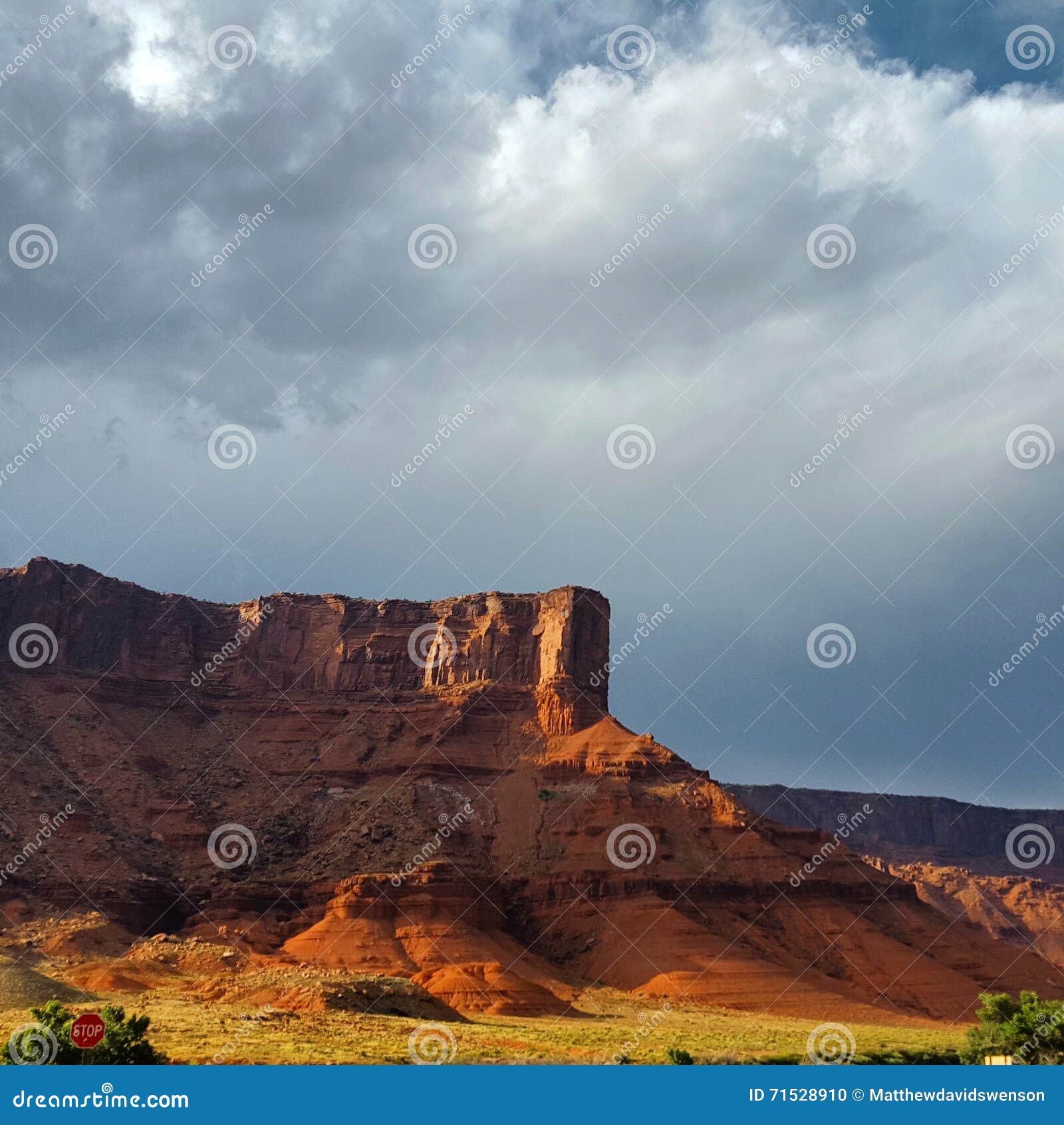 Red Rocks and Storm Clouds stock photo. Image of storm - 71528910