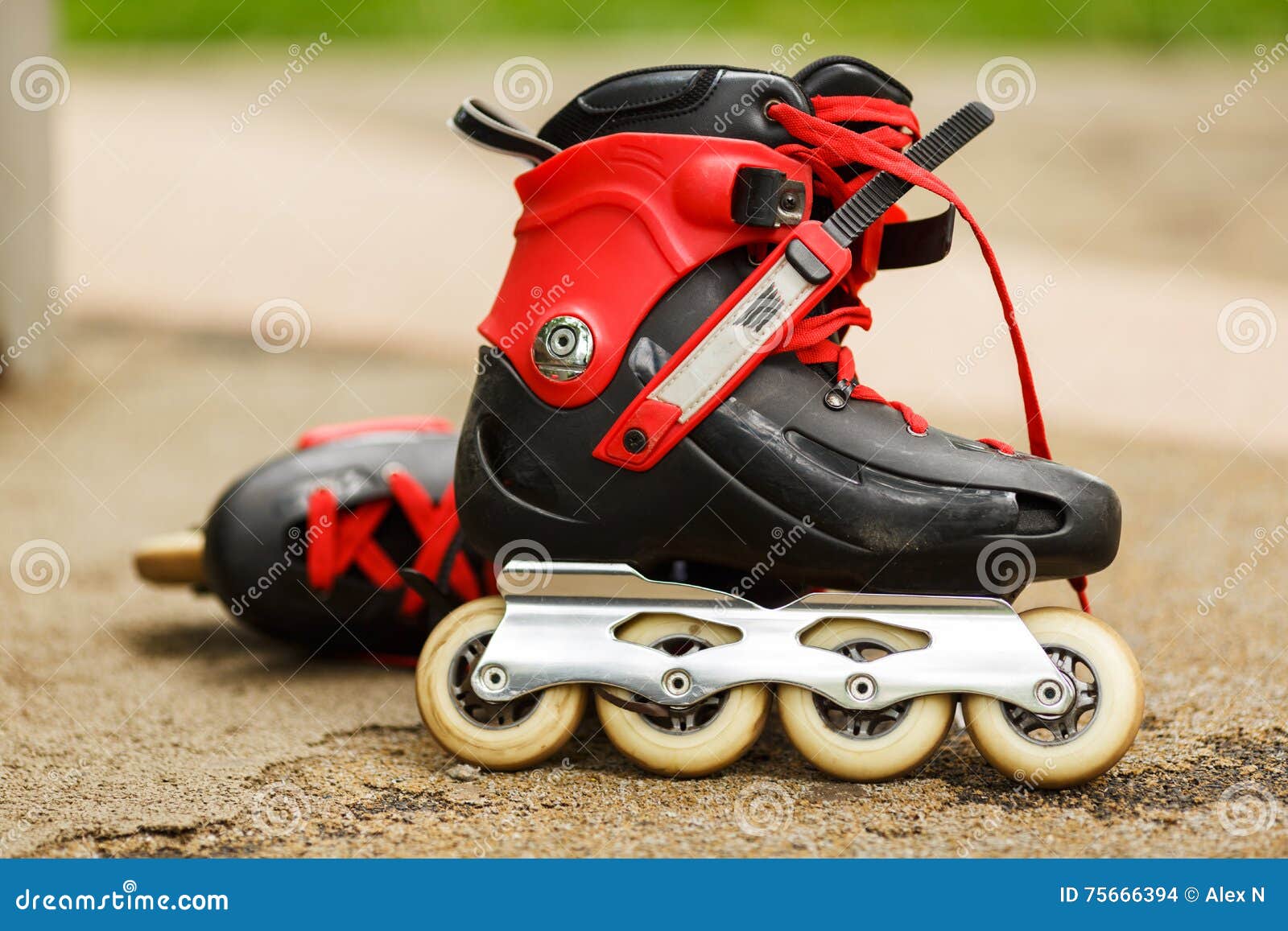 Red Roller Blades Close-up on Nature Background Stock Photo - Image of ...