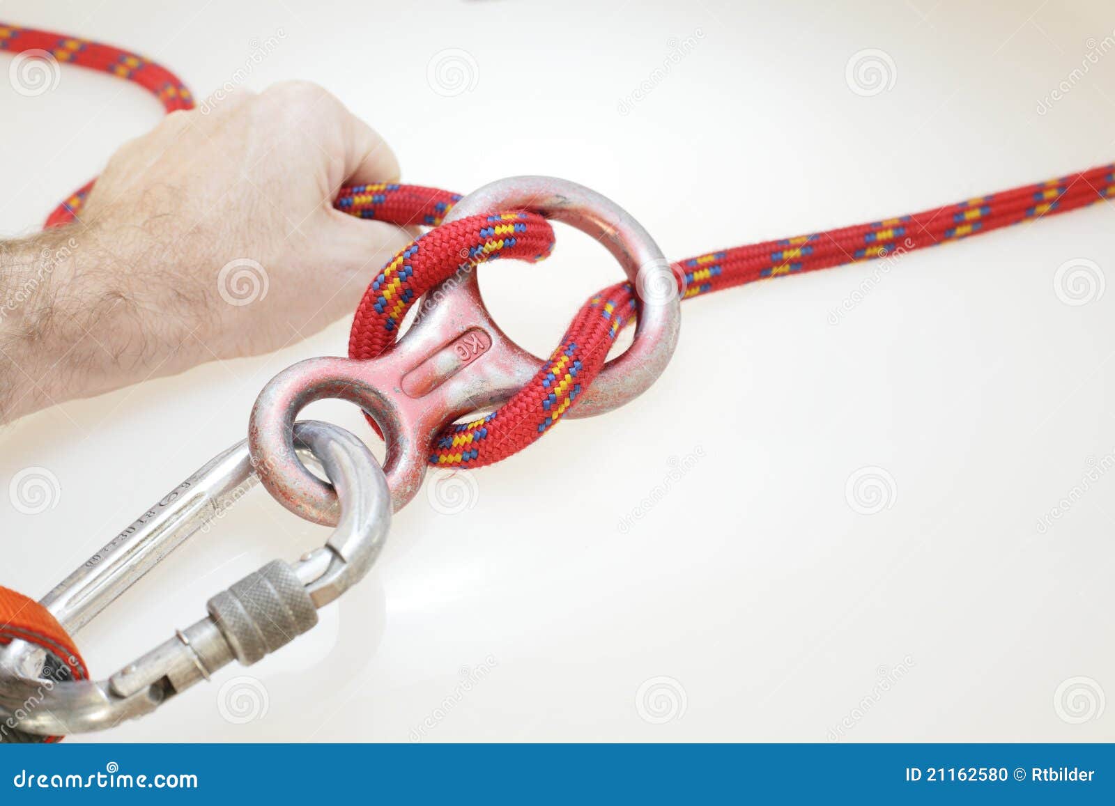 Red rope and carabiner stock photo. Image of granitepeaker - 21162580
