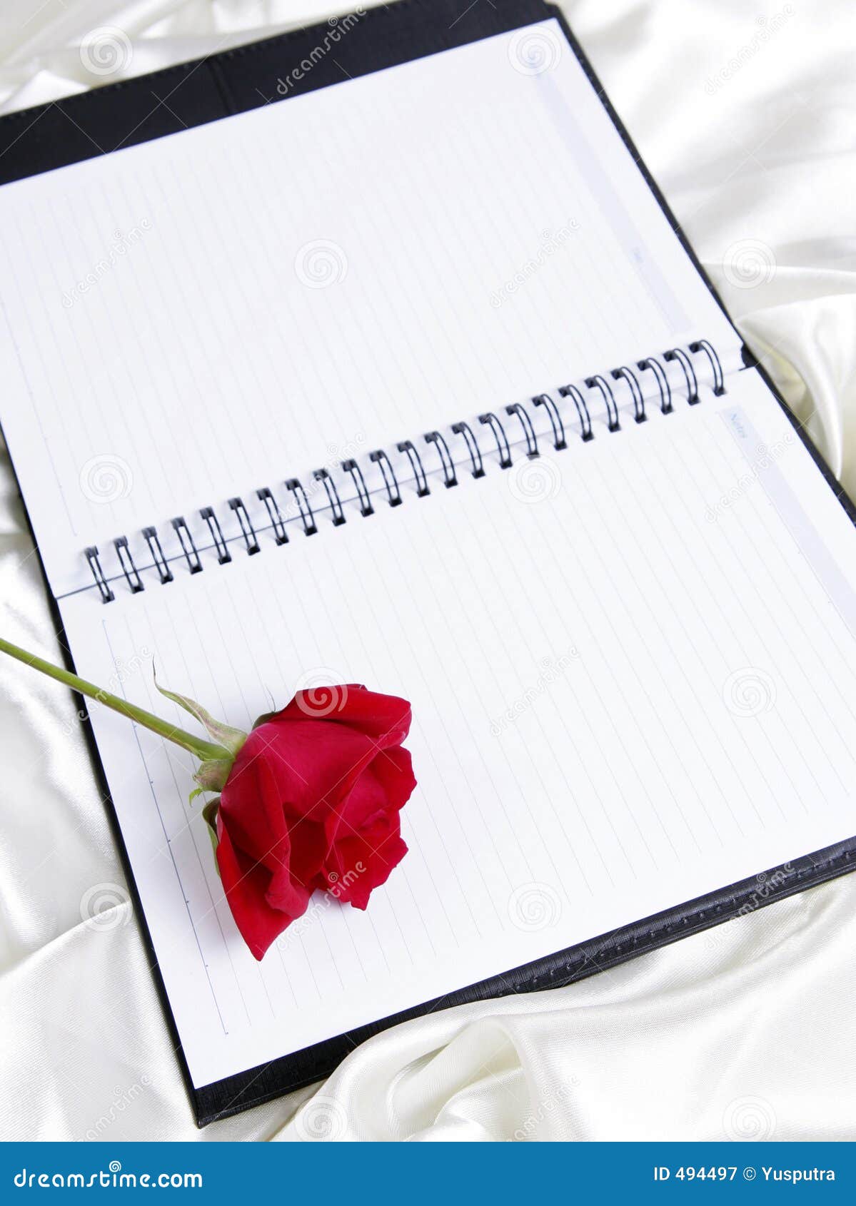 Red rose on blank notepad stock image. Image of passion - 494497