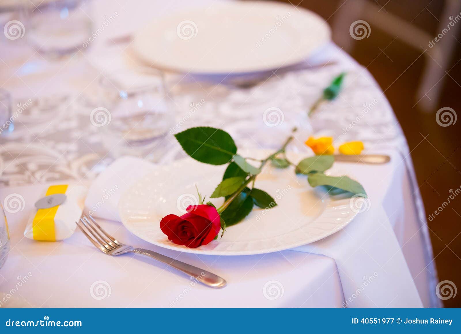 Red Rose on Wedding Dinner Plate Stock Image - Image of passion ...