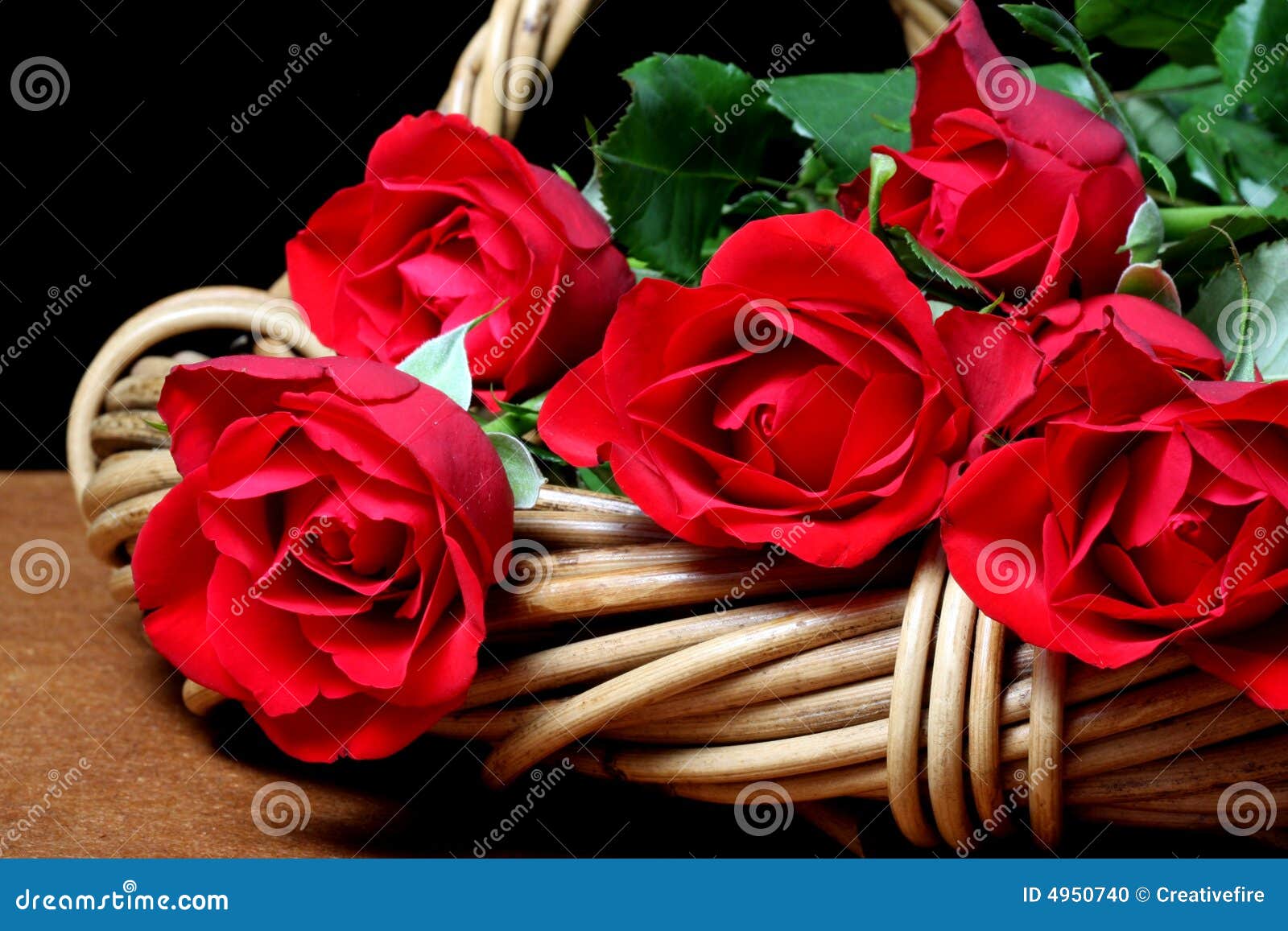Red Roses in Basket stock photo. Image of romantic, caneware - 4950740