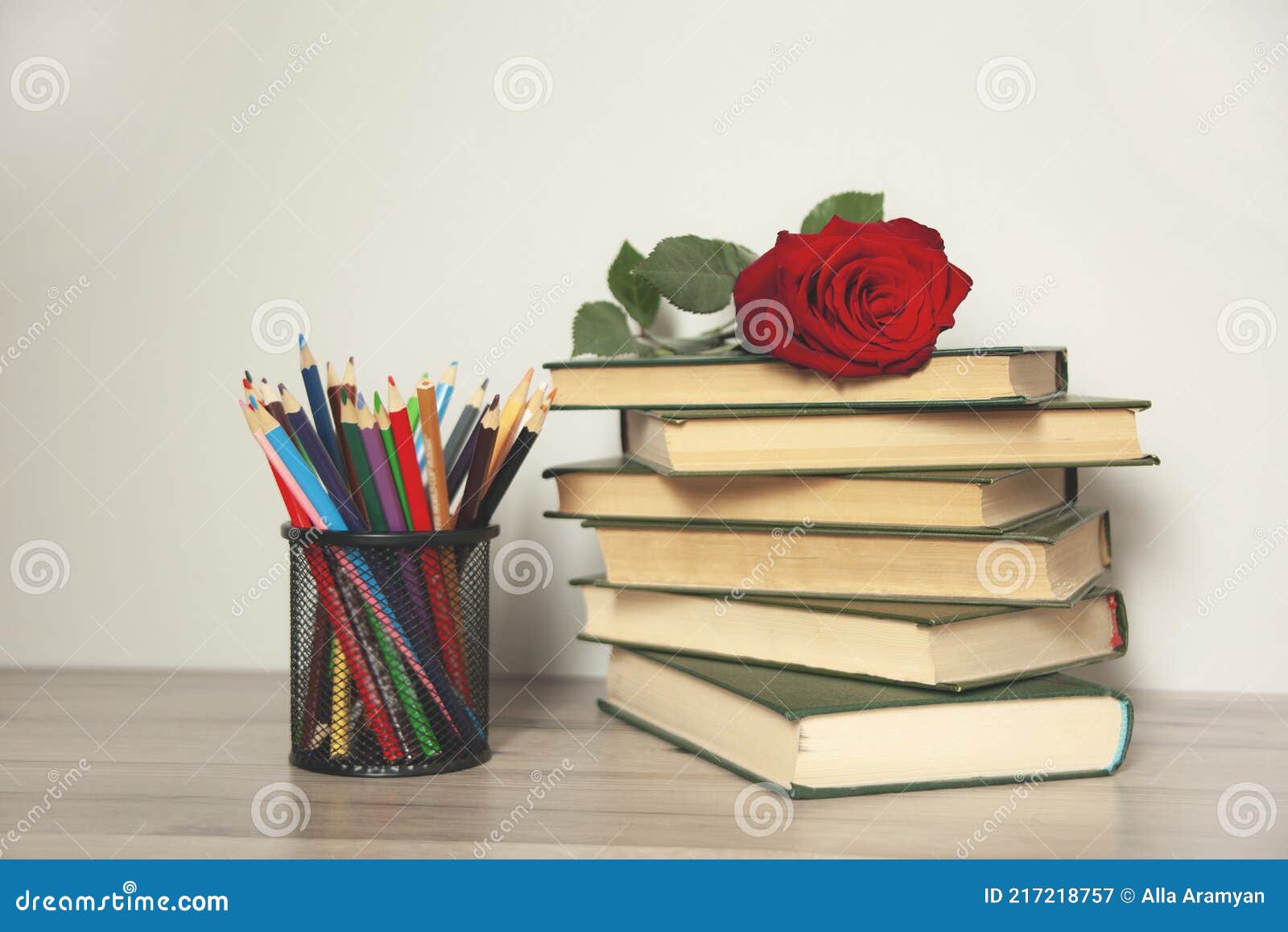 Red roses on the book stock image. Image of library - 217218757