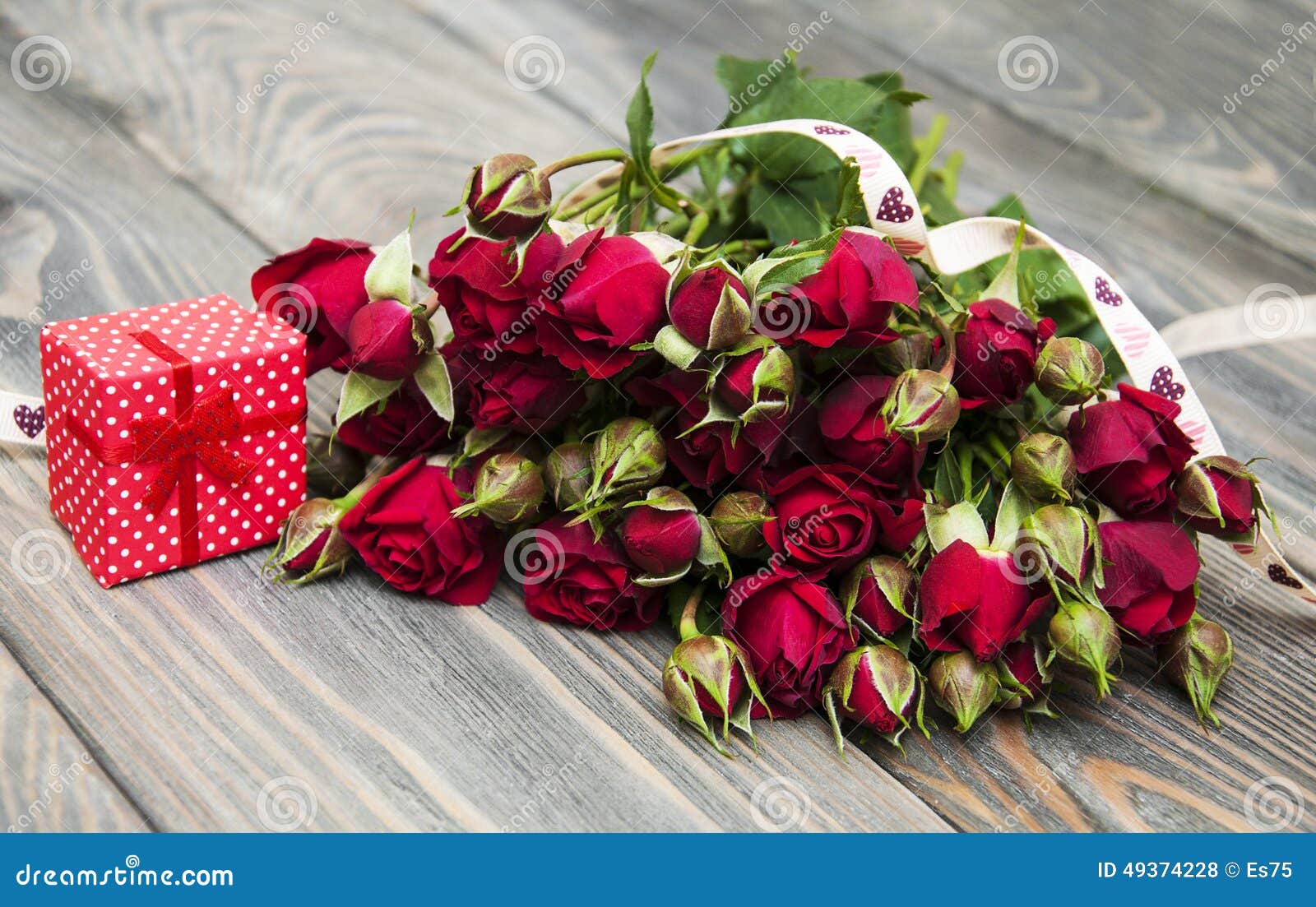 Red roses and gift box stock photo. Image of closeup - 49374228