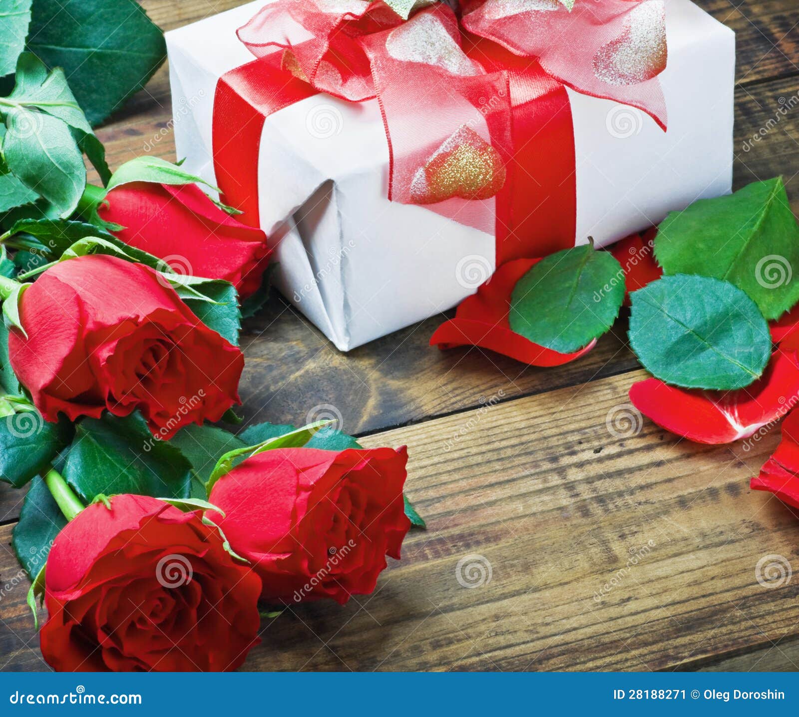 Red roses and holiday gift stock image. Image of ribbon - 28188271