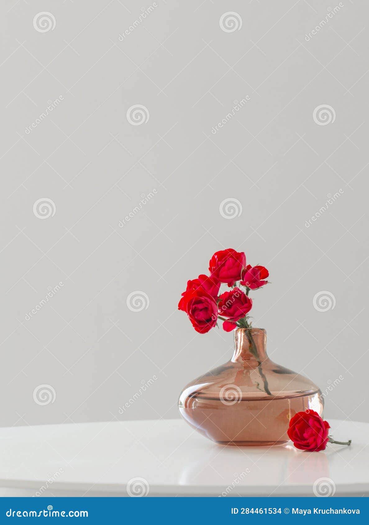 Red Roses in Modern Glass Vase in White Interior Stock Photo - Image of ...
