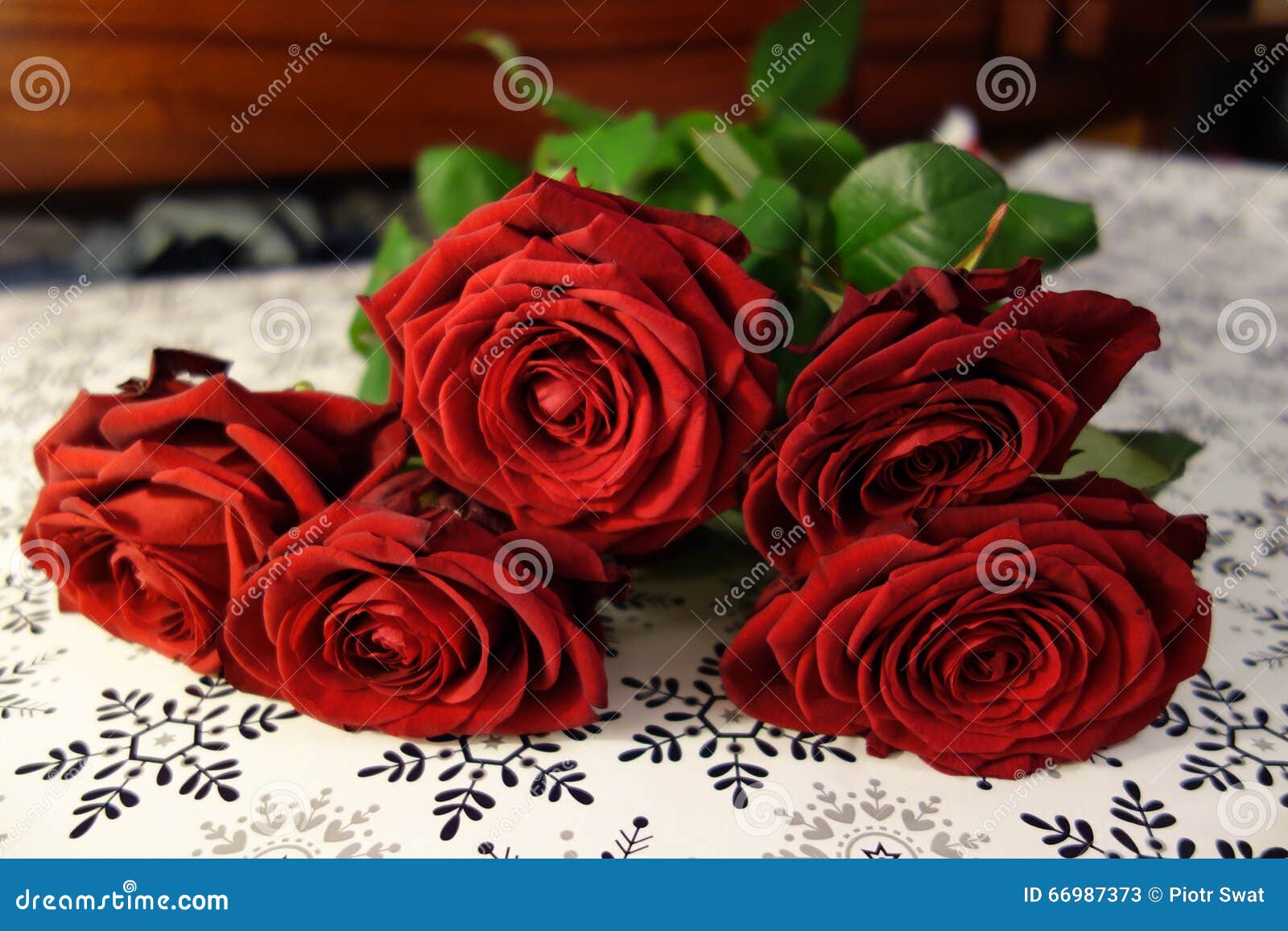 Red roses on table stock image. Image of plant, valentines - 66987373