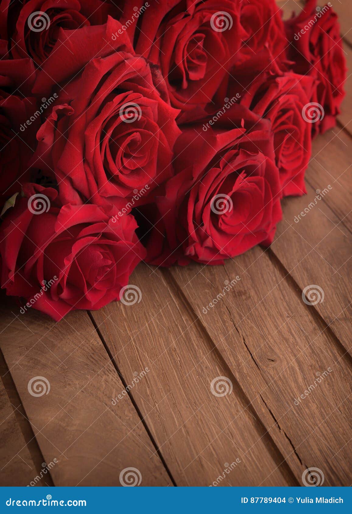 Red roses on table stock photo. Image of floral, bloom - 87789404