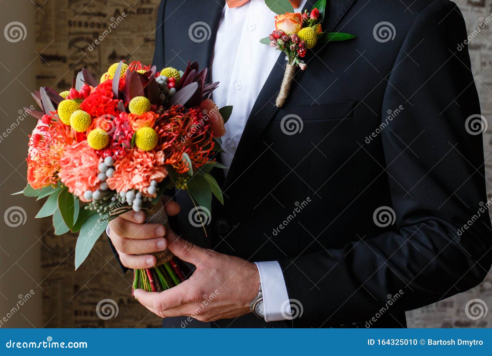 Red Roses Wedding Bouquet in Hands of the Grrom Stock Photo - Image of ...
