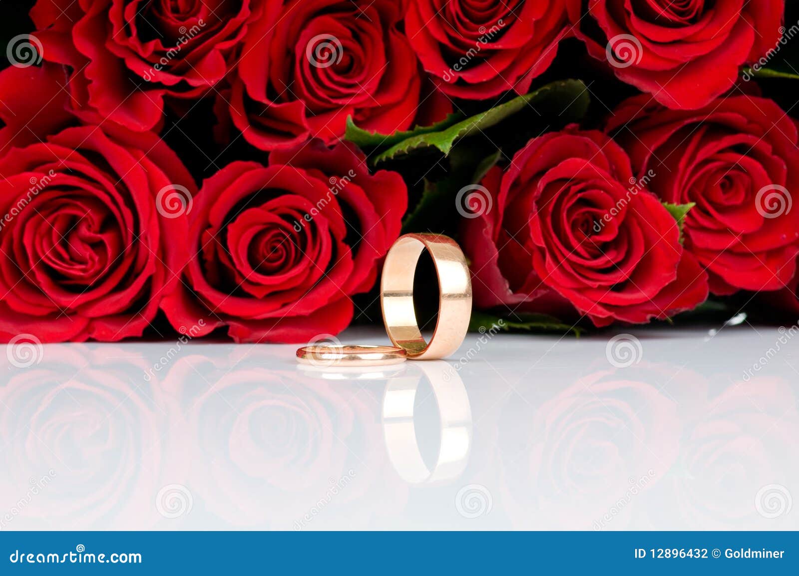 Red Roses and Wedding Rings Stock Photo - Image of petal, beauty: 12896432