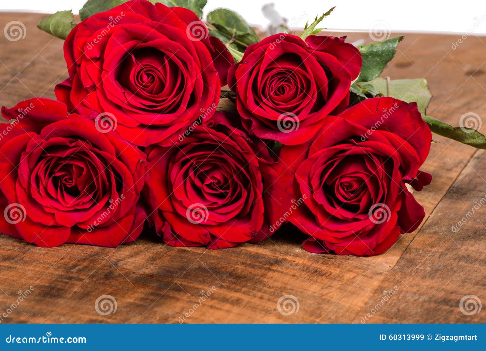 Red Roses on a Wooden Table Stock Image - Image of 14th, romance: 60313999