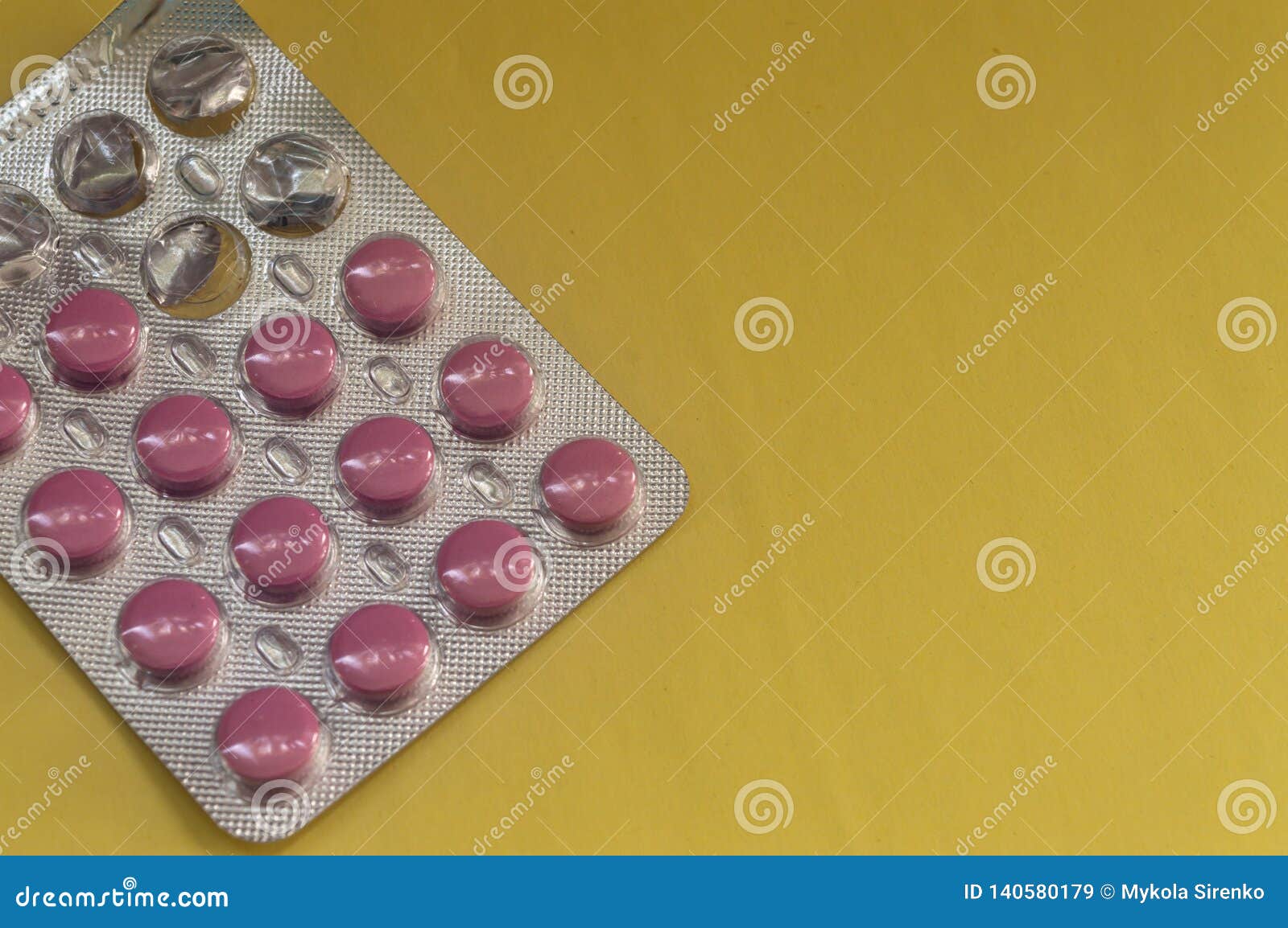 Red Round Tablets In An Open Package On A Yellow Background Stock Image ...