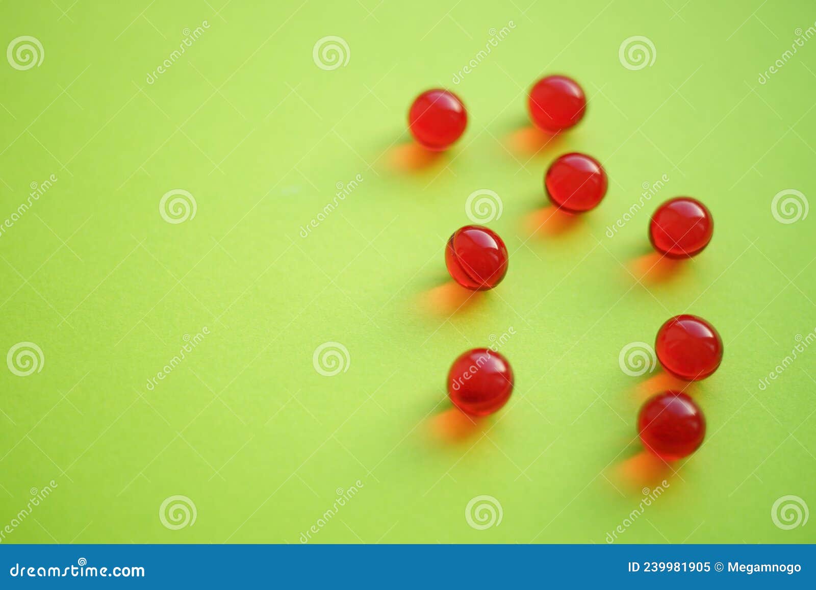 Red Round Vitamins on a Green Table. Copy Space Stock Image - Image of ...
