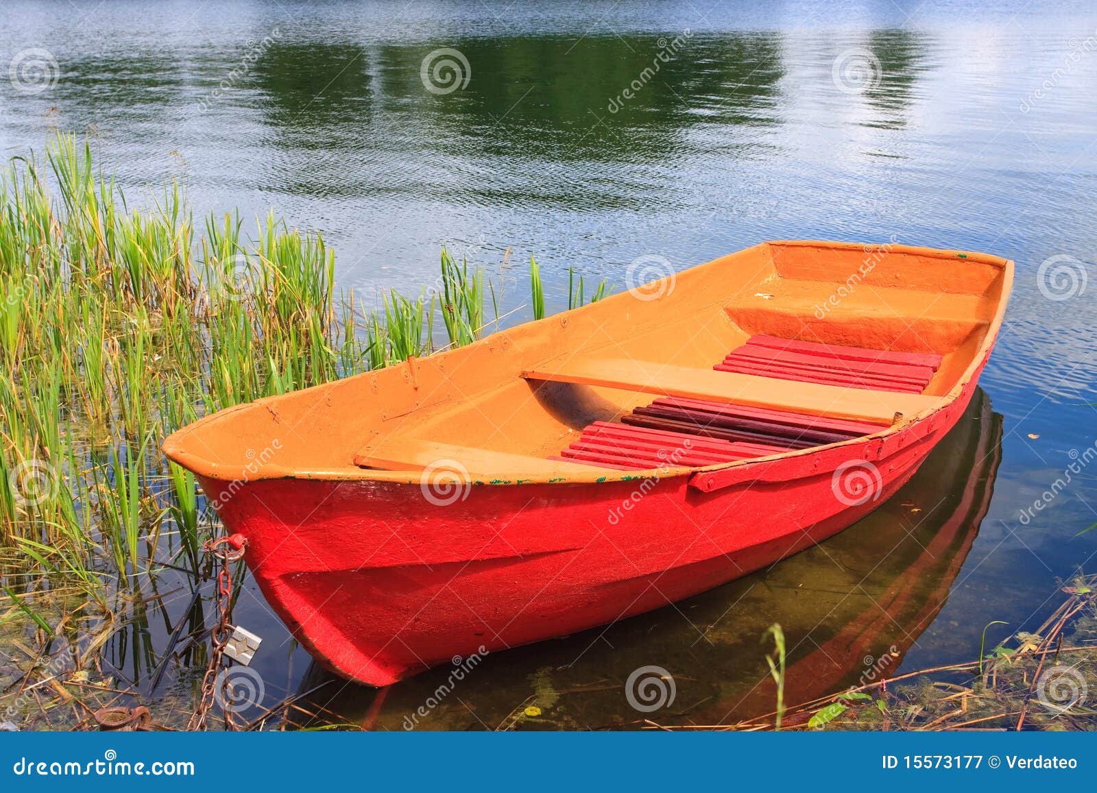 Red rowing boat stock image. Image of grunge, grass, transportation ...