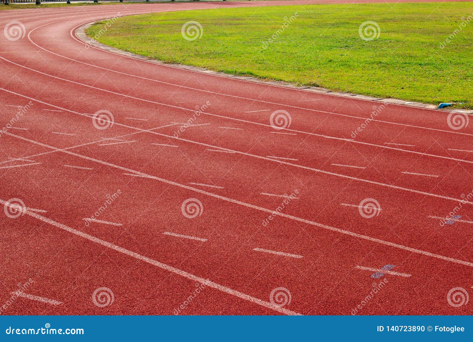 Red Running Track Synthetic Rubber on the Athletic Stadium Stock Photo ...