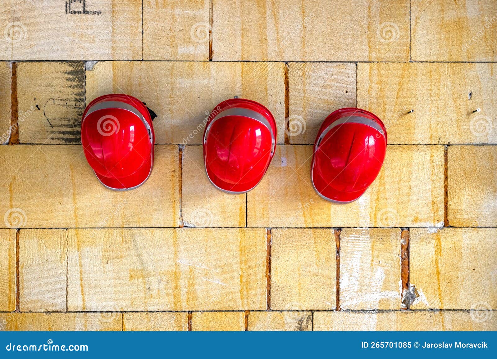 Red Safety Helmets on a Construction Site Stock Image - Image of ...