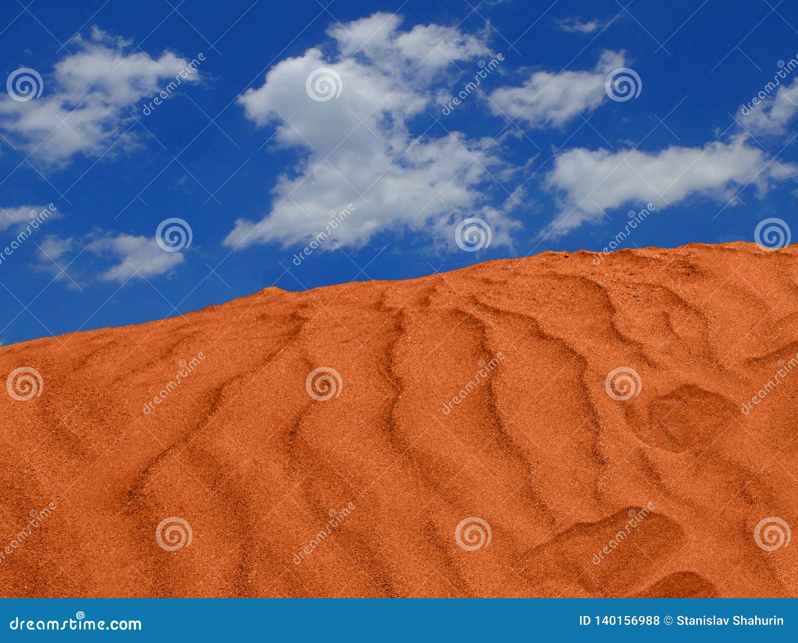 Red Sand Ripple in the Desert. Ripples in the Sand with the Clouds ...