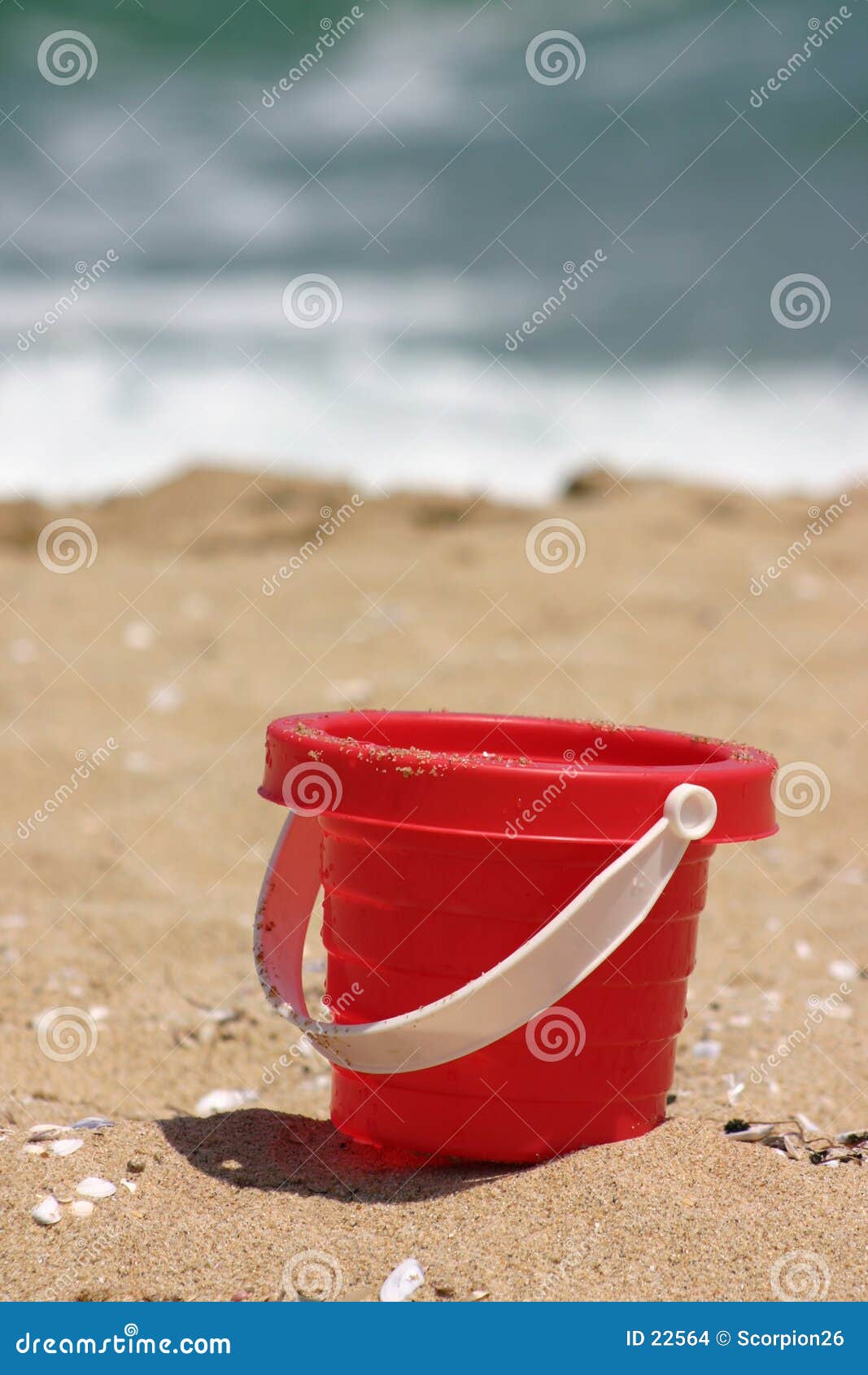 Red Sand Toy on the Beach stock photo. Image of water, sand - 22564