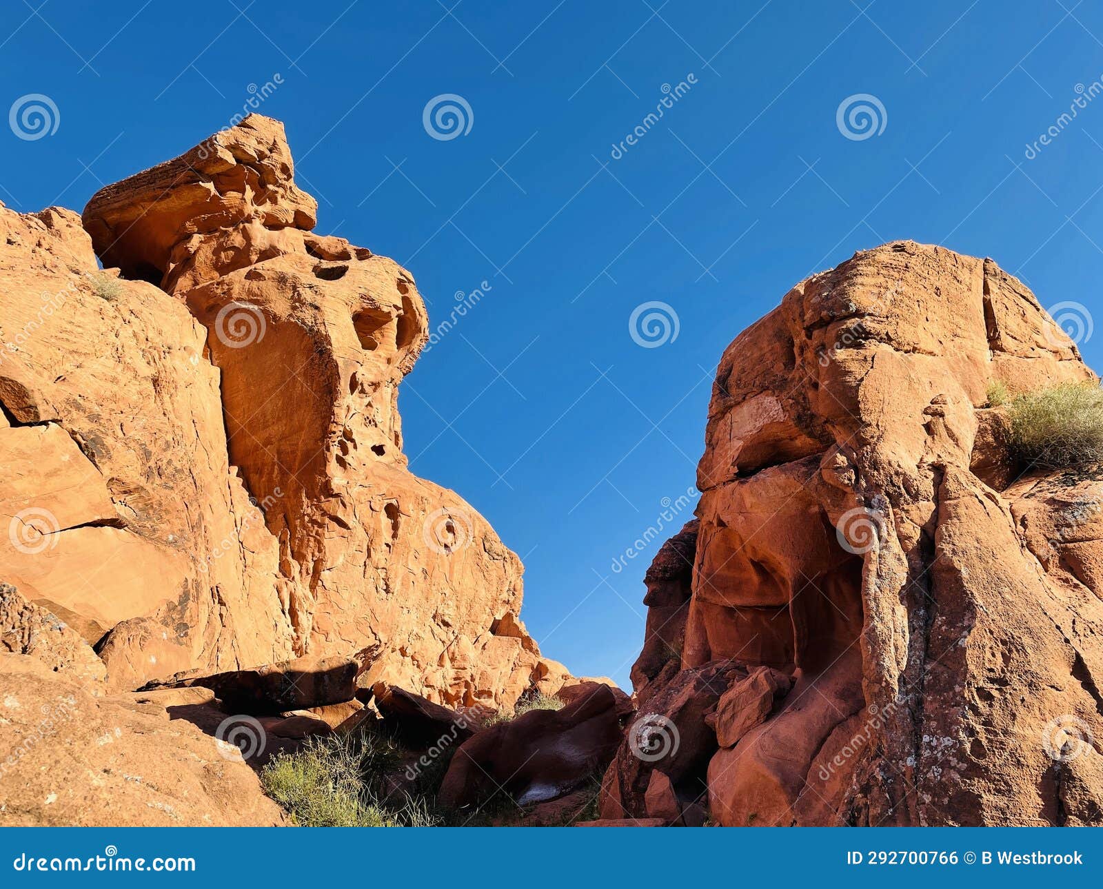 Rock Formations with Faces Under a Blue Sky Stock Photo - Image of ...