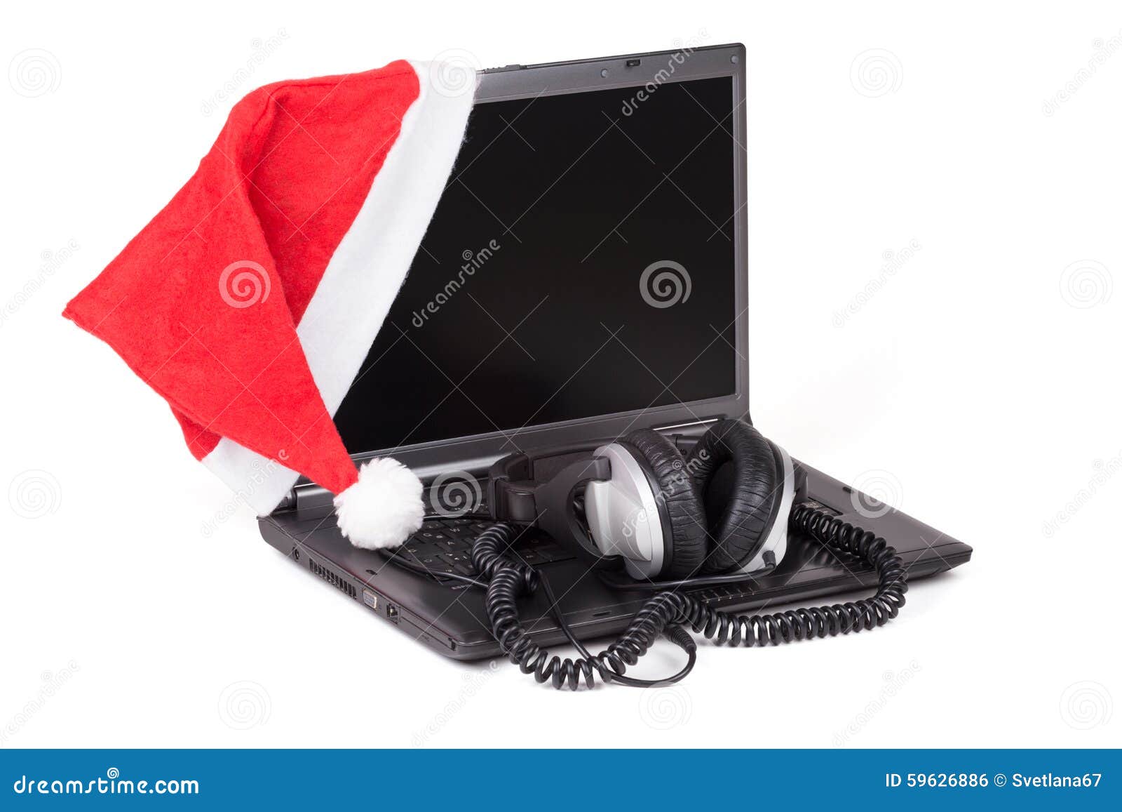 Red Santa Hat on the Notebook Computer with Headphones Stock Photo ...