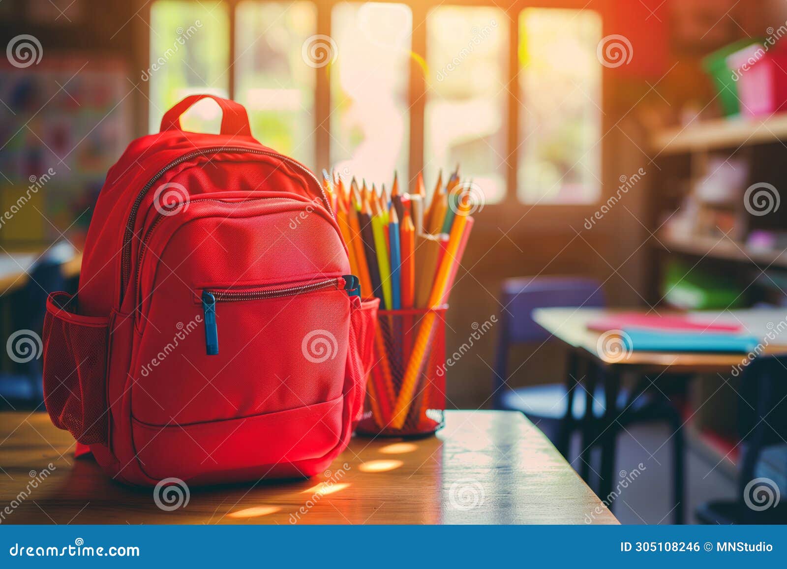 Red School Backpack on a Table in Classroom on Sunny Morning. Back To ...