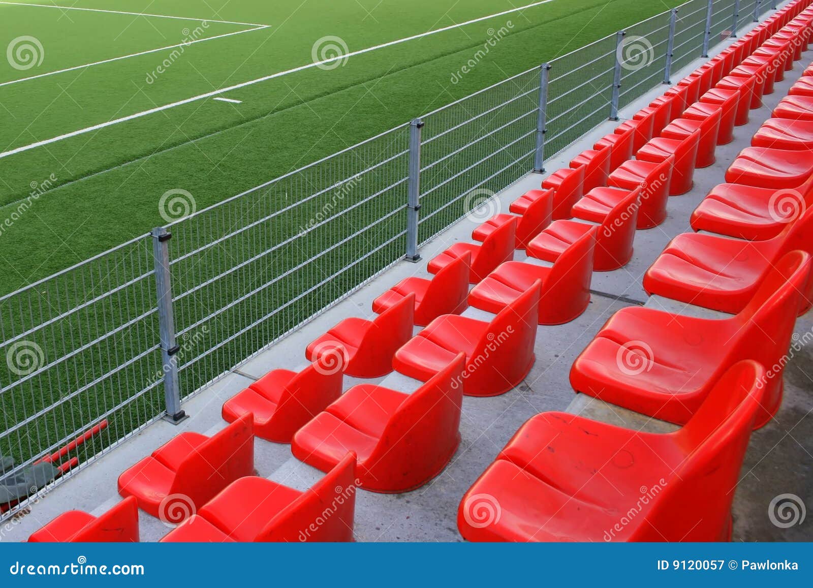 Red seats on the stadium stock image. Image of ground - 9120057