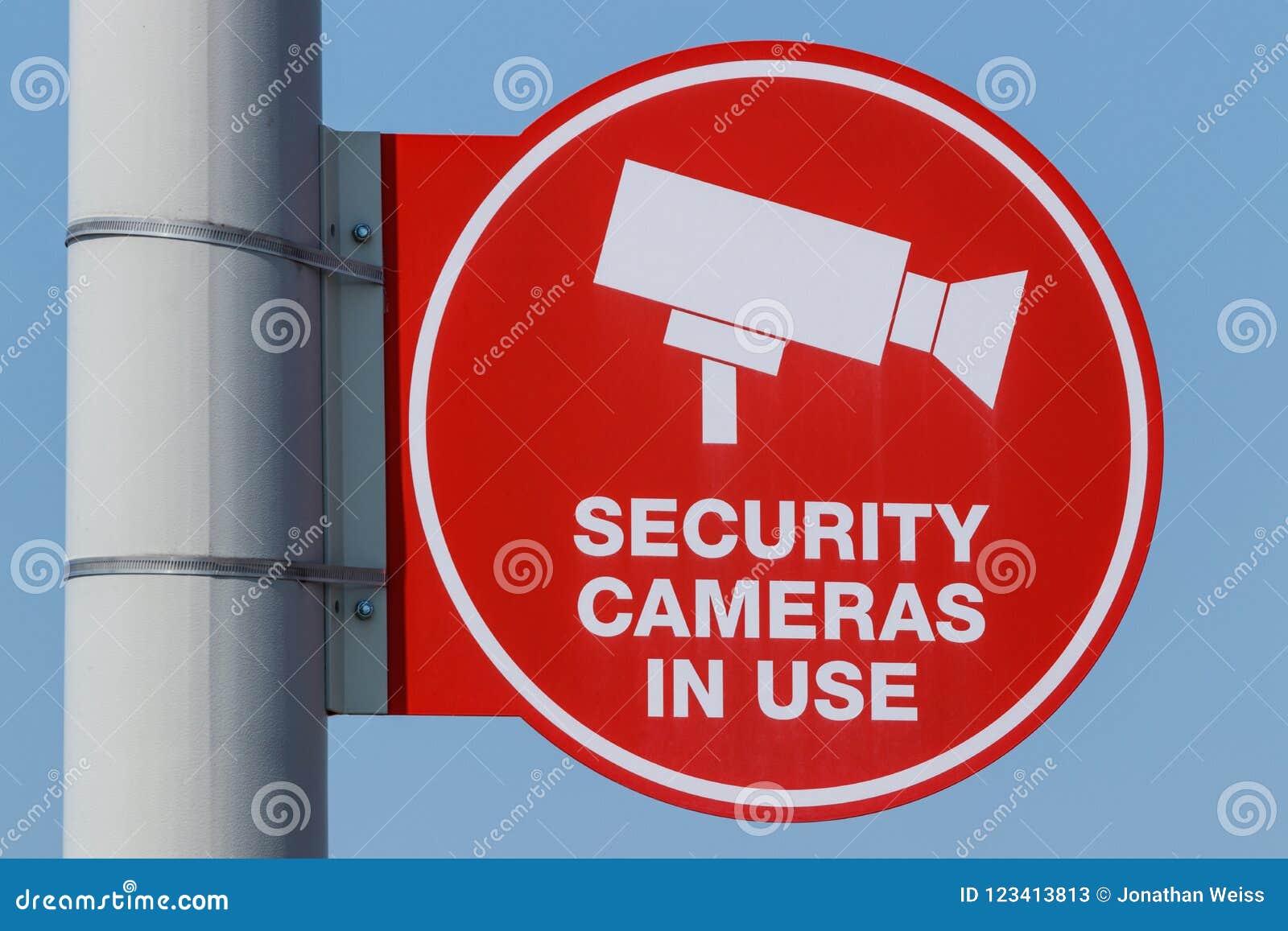 Red Security Camera in Use Sign on Gray Post and Sunny Blue Sky Stock ...