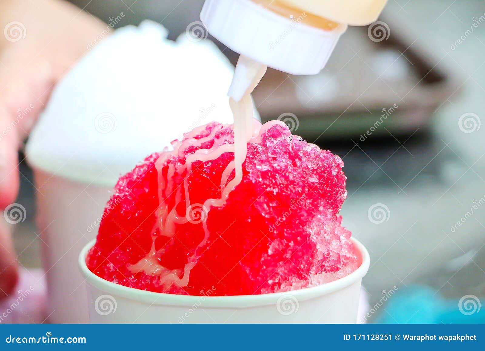 Red Shaved Ice that is Clear Condensed Milk is Hot in the Summer Stock ...