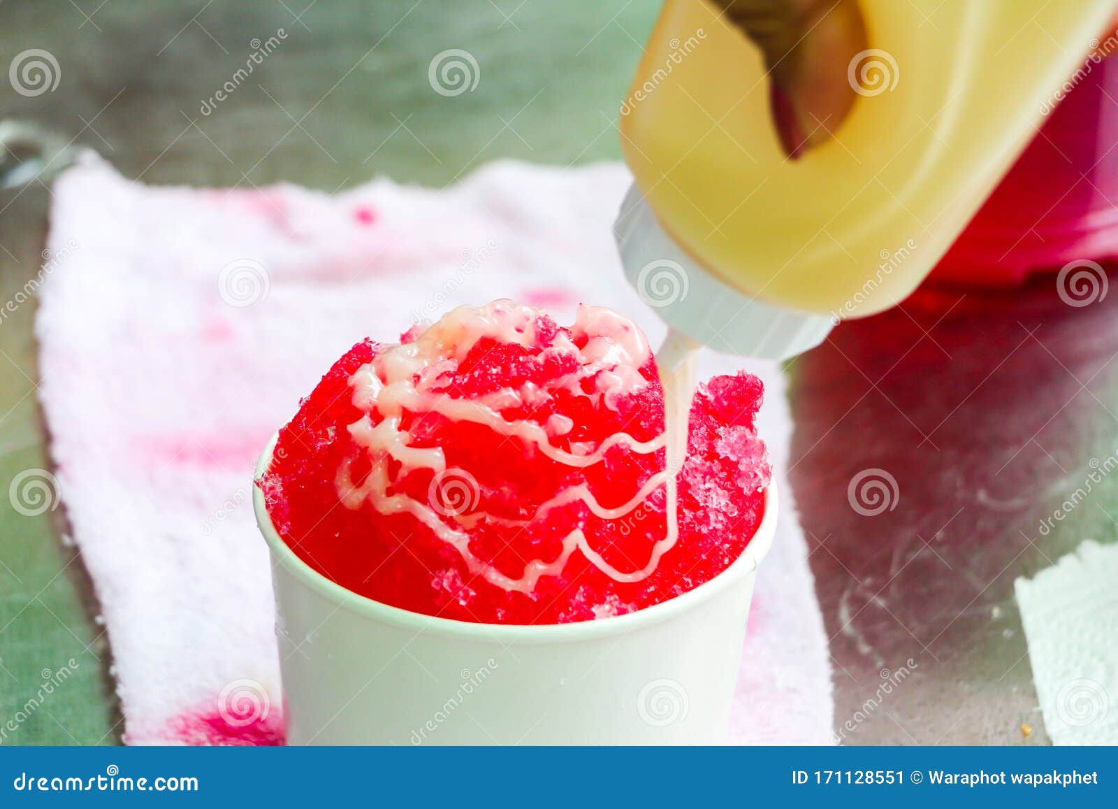 Red Shaved Ice that is Clear Condensed Milk is Hot in the Summer Stock ...