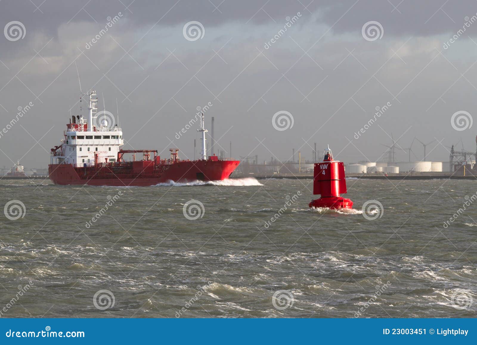 A red ship leaves port stock image. Image of harbor, bulk - 23003451