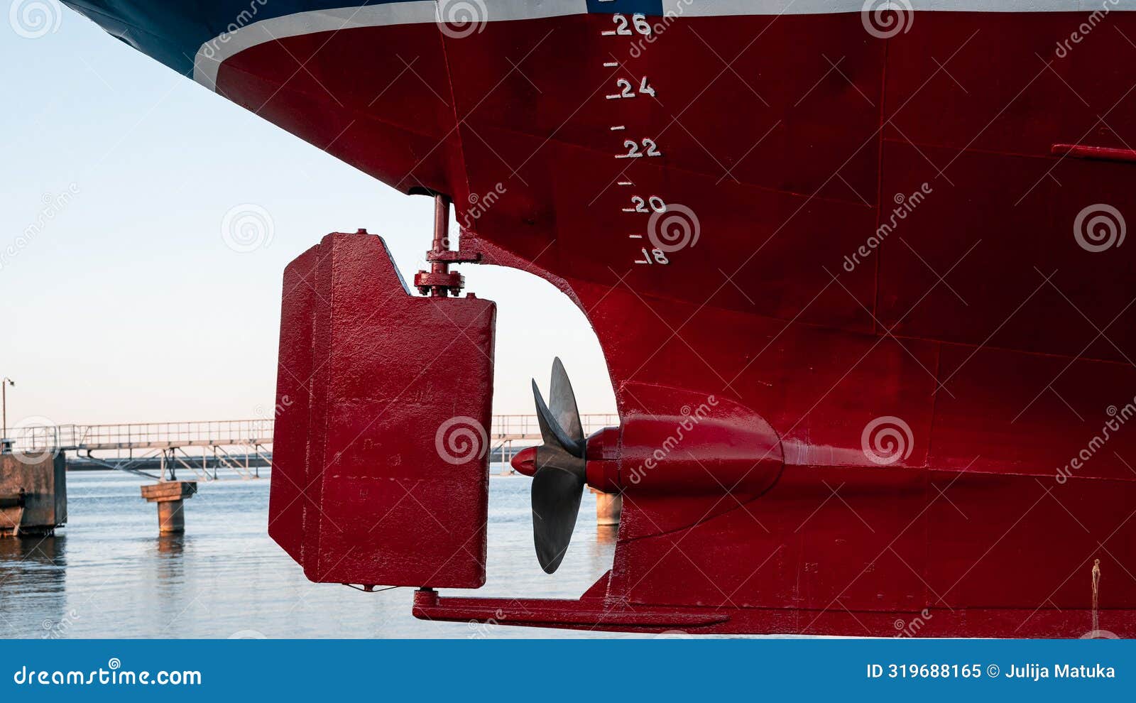 A Red Ship with a Propeller on the Side Stock Image - Image of boat ...