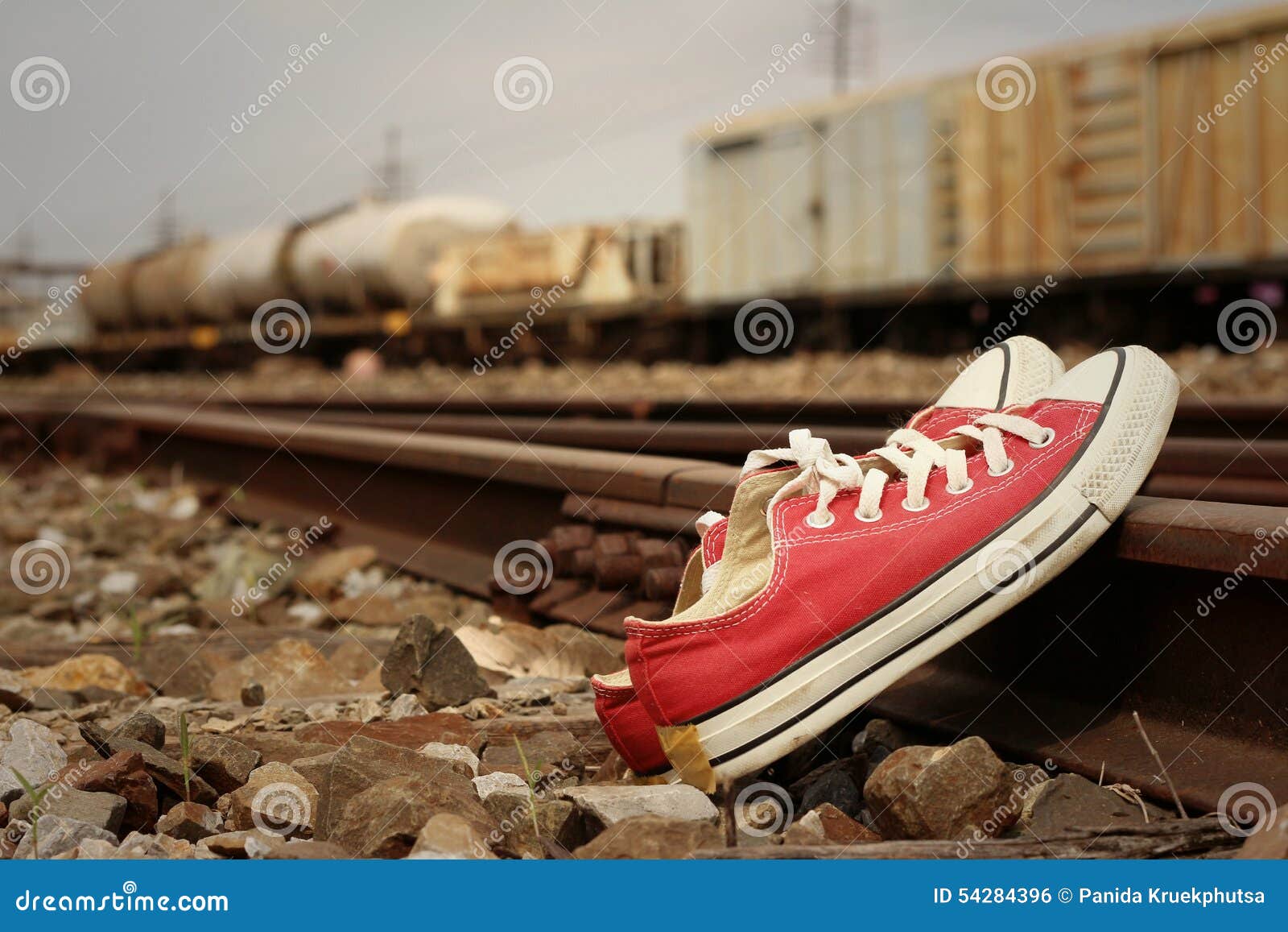 Red Shoes Leaning on the Train Tracks. Stock Photo - Image of journey ...
