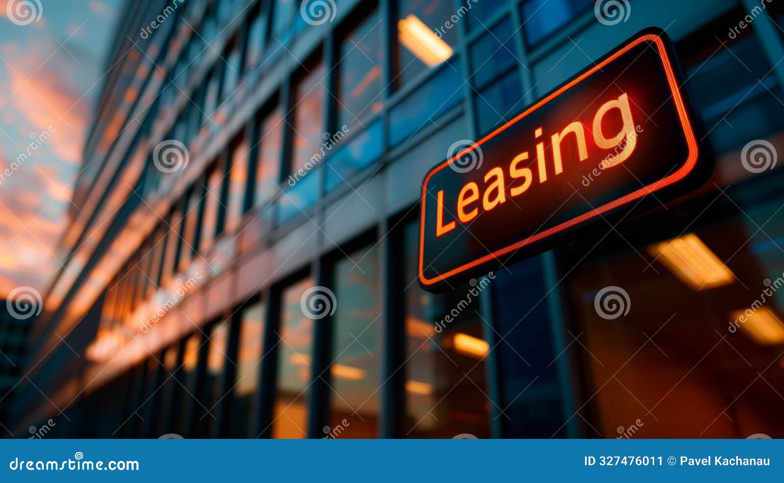 A Red Sign with Leasing in White Letters Hangs on the Side of a Modern ...