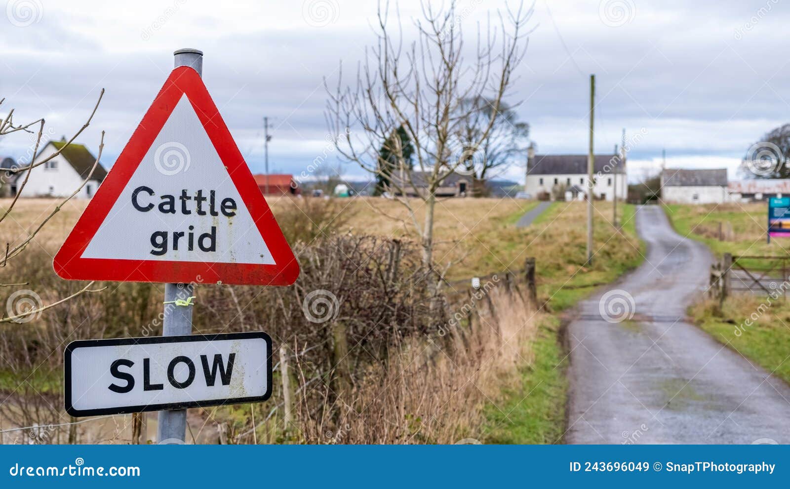 Red Sign Warning Cattle Grid Ahead on a Farm and To Slow Down Editorial ...
