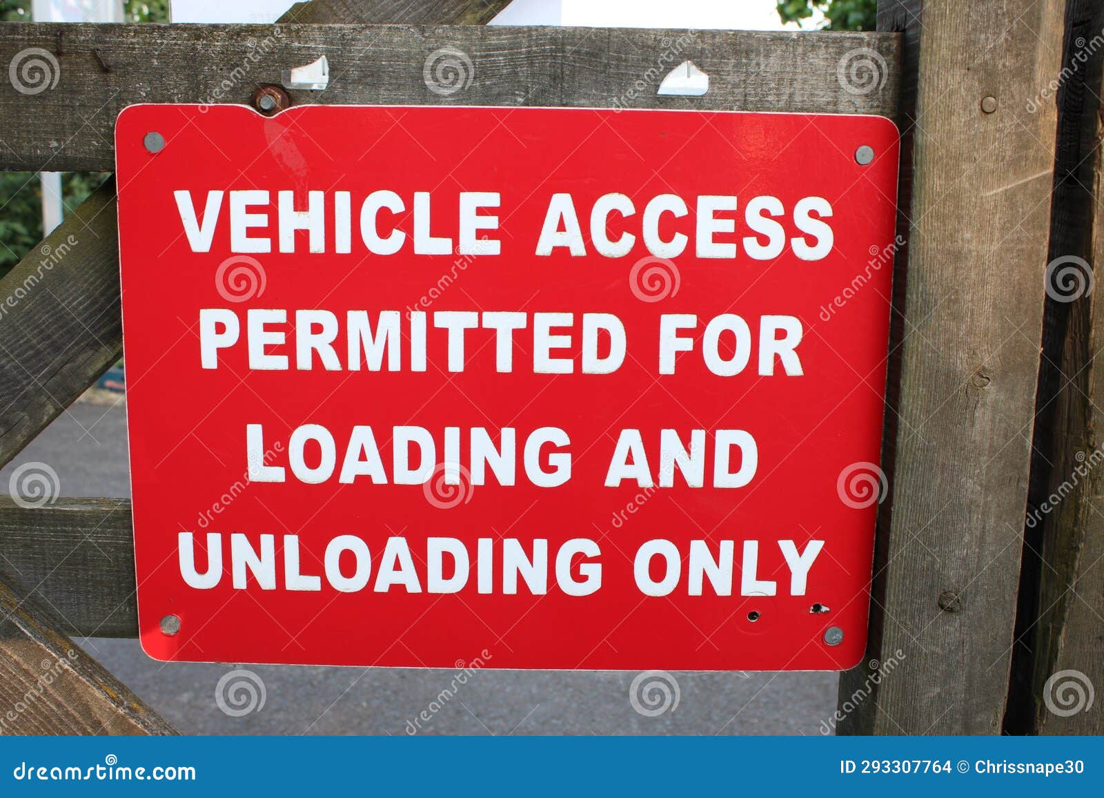 Red Sign with White Text "Vehicle Access Permitted for Loading and ...