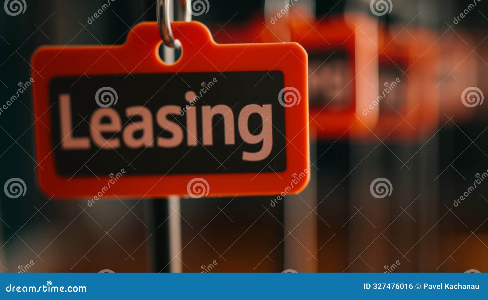 A Red Sign with the Word Leasing is Hung in a Retail Setting Stock ...