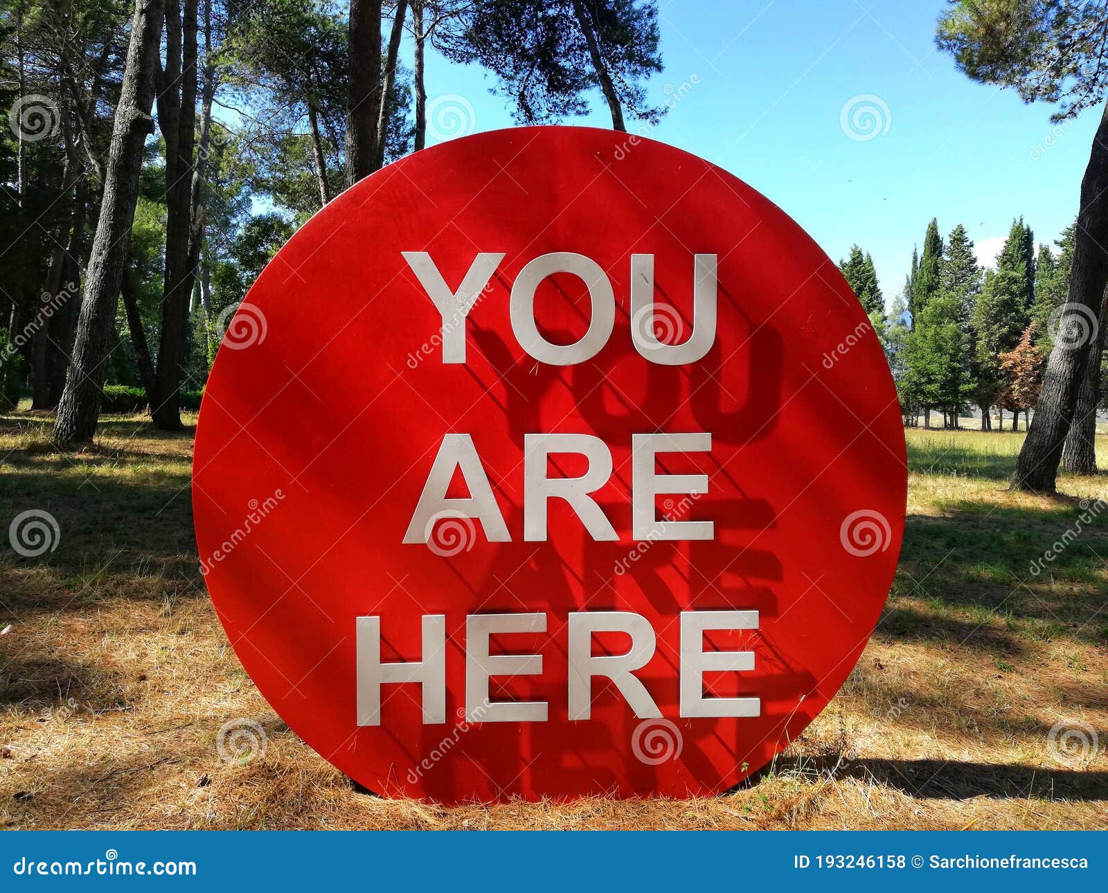 Red sign you are here stock photo. Image of mapping - 193246158