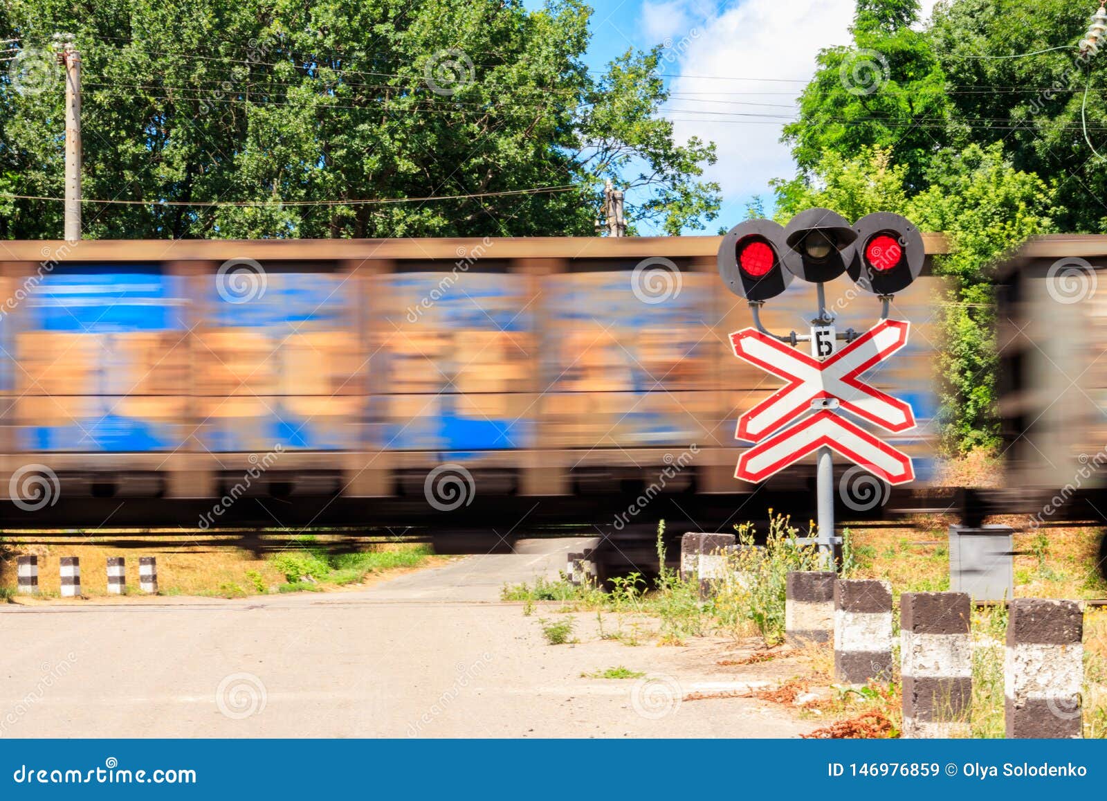Red Signal of Semaphore and Stop Sign in Front of Railroad Crossing ...