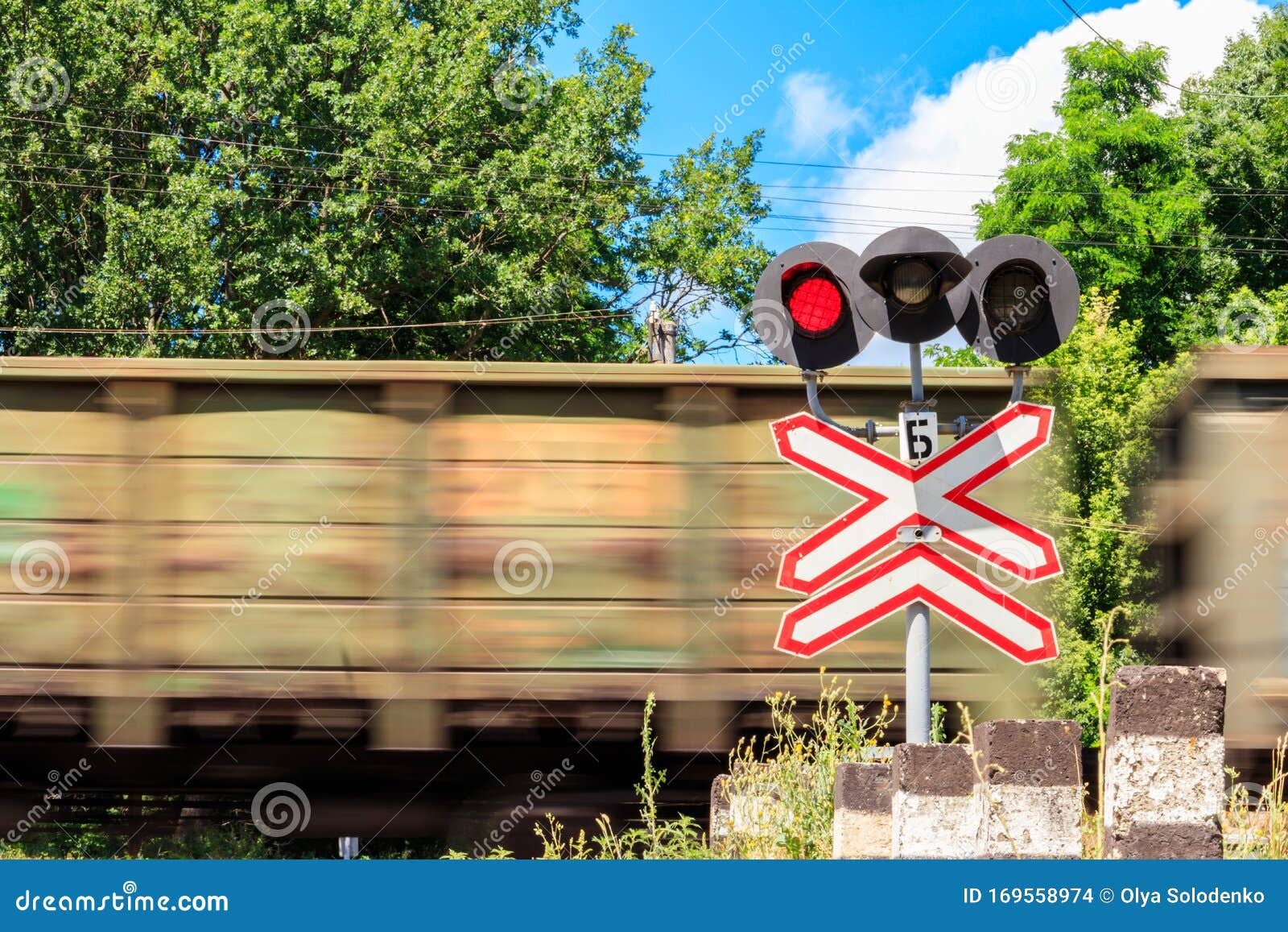 Red Signal of Semaphore and Stop Sign in Front of Railroad Crossing ...